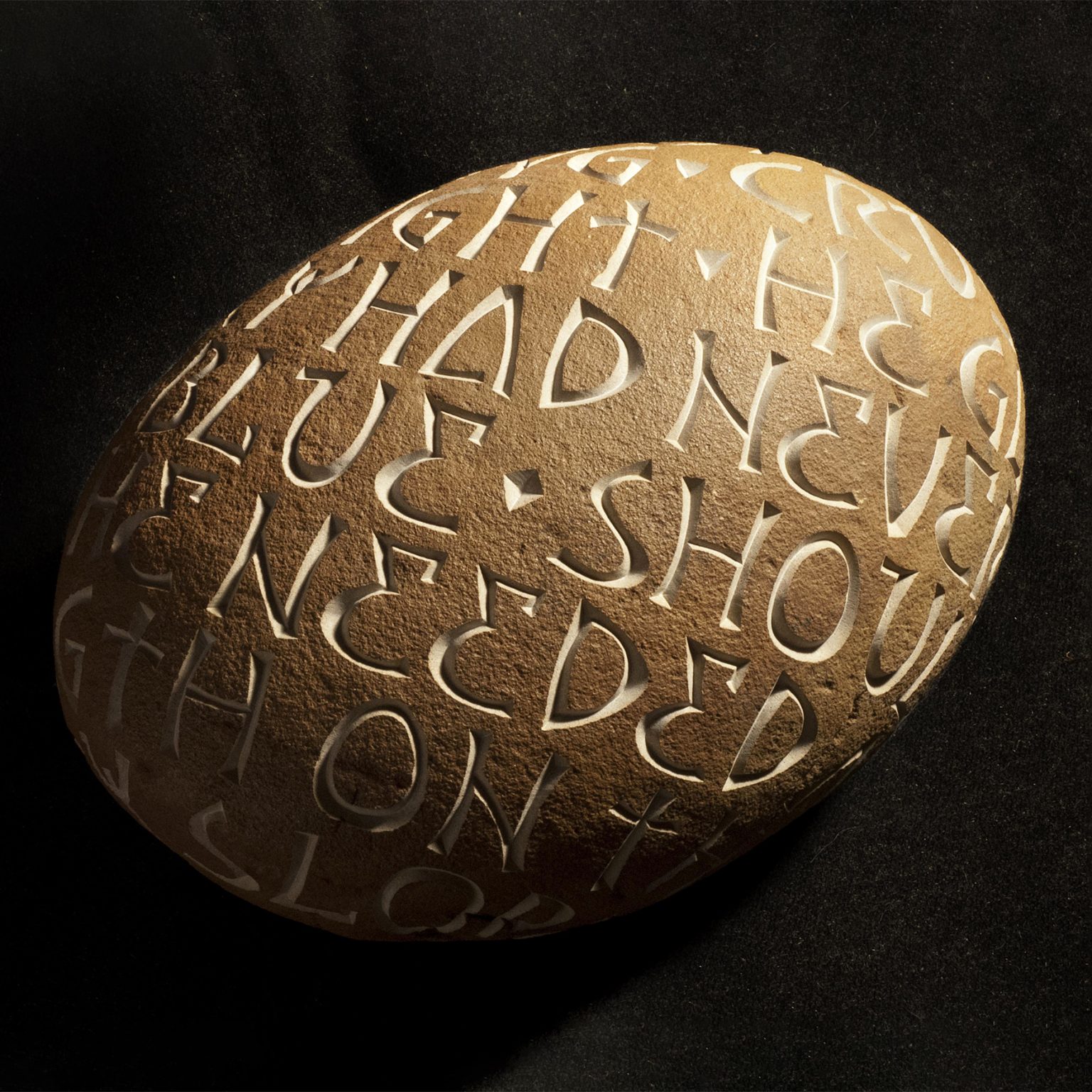 Sisyphus letters in stone – Robbie Schneider